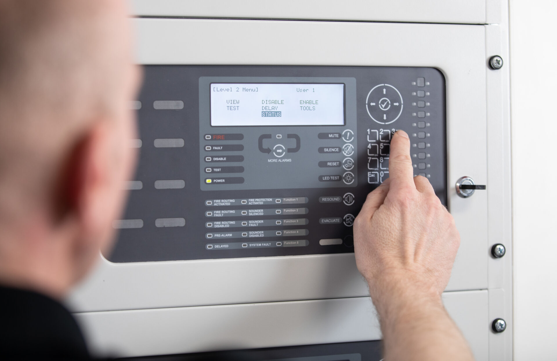 What is a fire alarm system control panel?